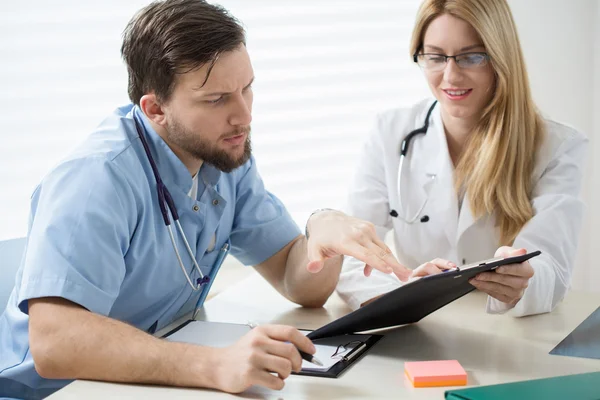 Discussing a difficult case - Stock Image - Everypixel