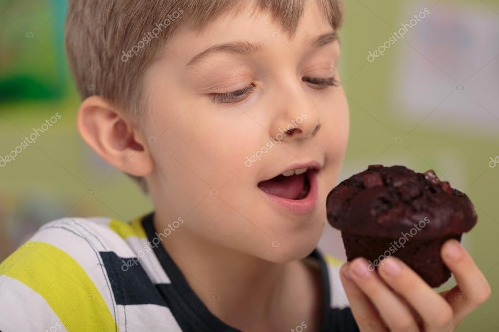 Kid Eating Cupcake