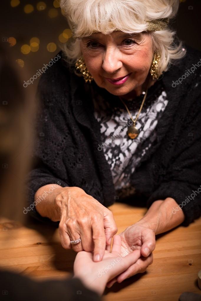 Hand reader telling future Stock Photo by ©photographee.eu 77738964