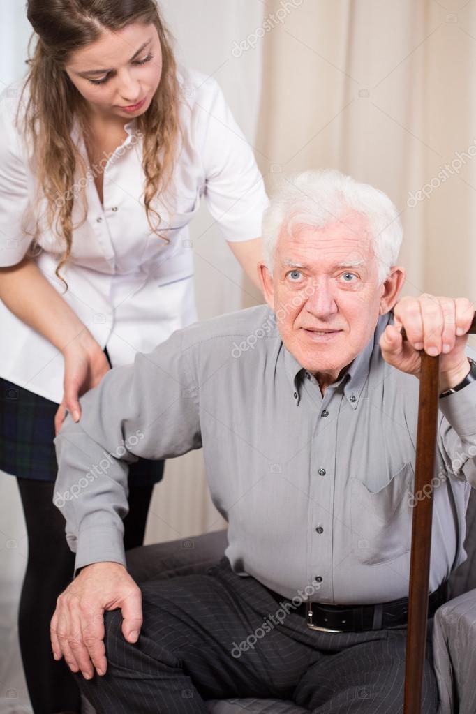 Senior trying to get up Stock Photo by ©photographee.eu 78223414