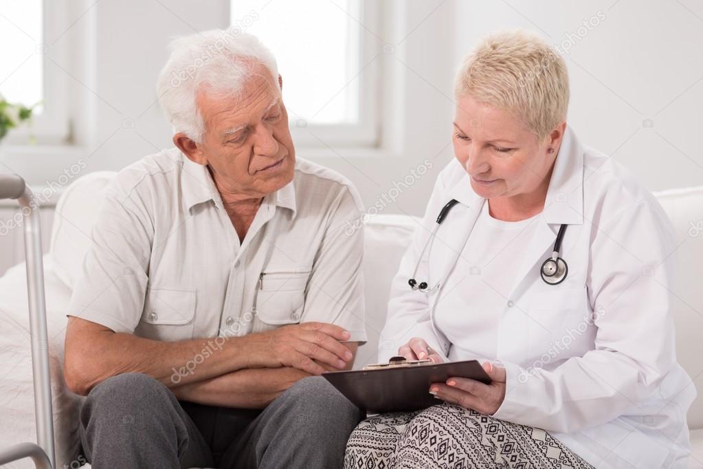 Patient during medical interview — Stock Photo © photographee.eu #79510844