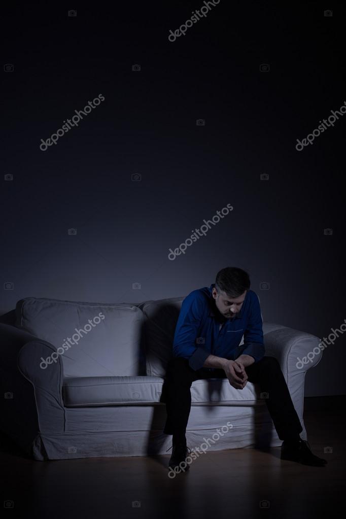 Lonely man in empty apartment — Stock Photo © photographee.eu #82342216