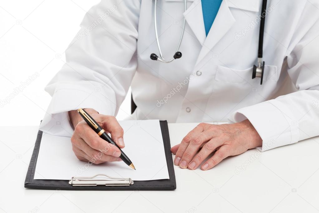 Doctor prescribing medicament Stock Photo by ©photographee.eu 83072712