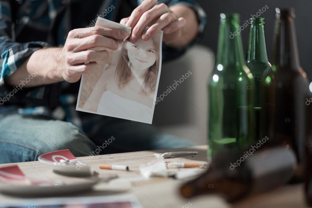 Tearing up a photo — Stock Photo © photographee.eu #83380232