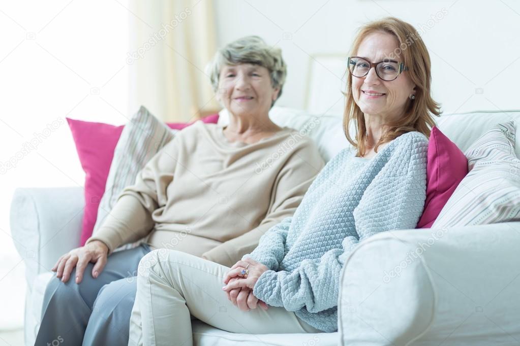 Daughter visiting elder mother — Stock Photo © photographee.eu #91106264