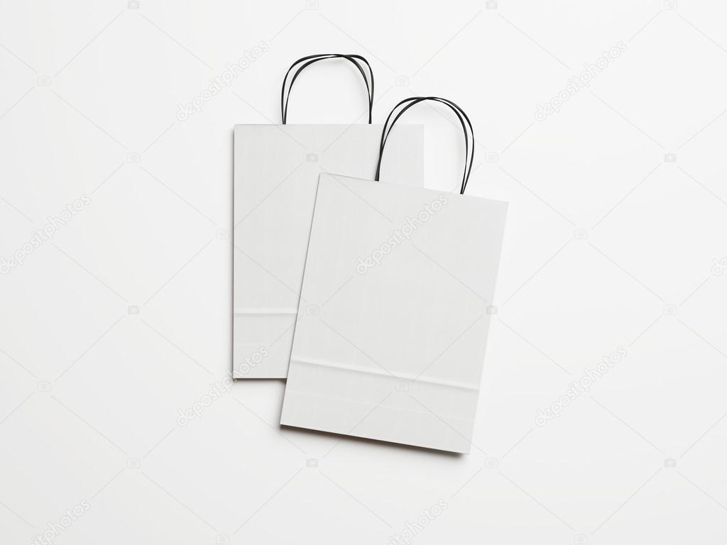 Two white paper bags with black handles Stock Photo by ©kantver 57651713