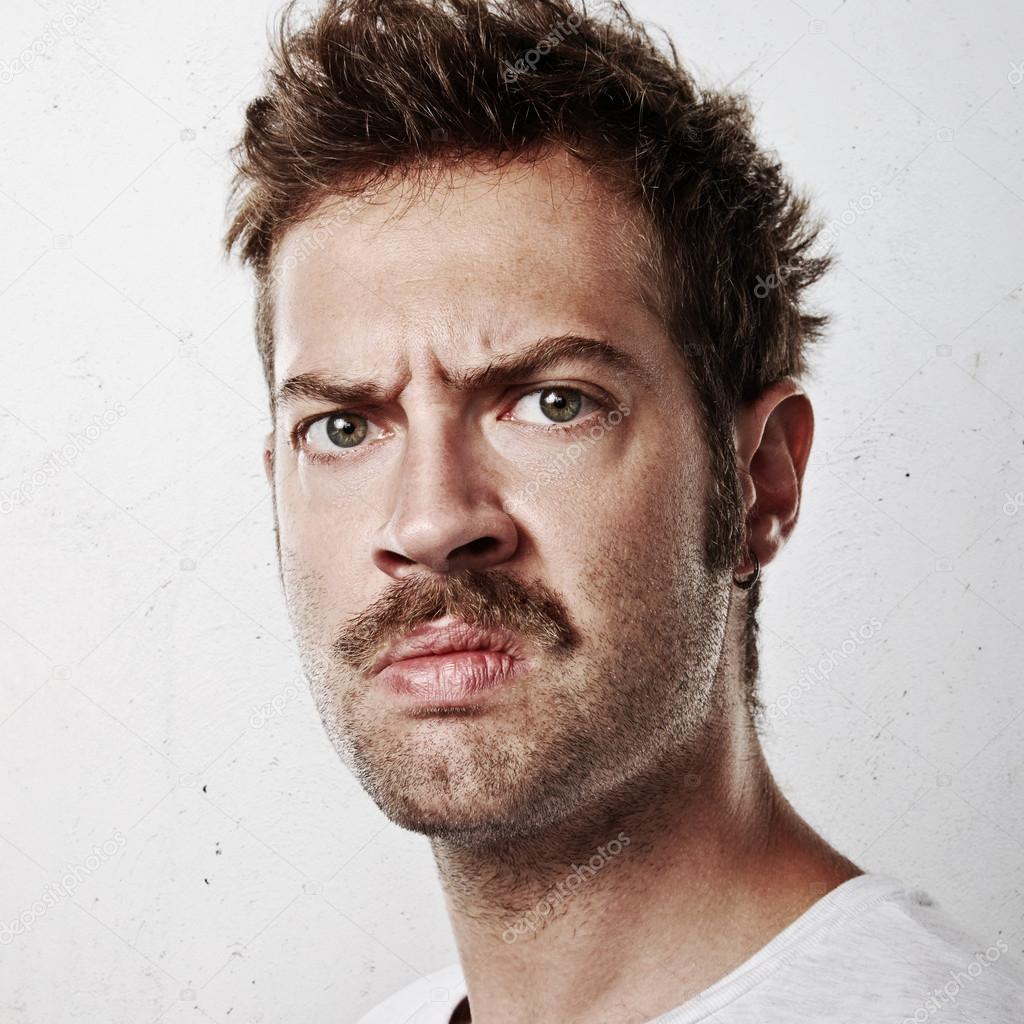 Young angry man ⬇ Stock Photo, Image by © kantver #58418511