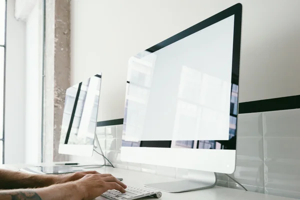 Workspace with two generic design computers Stock Photo by ©kantver 80299698
