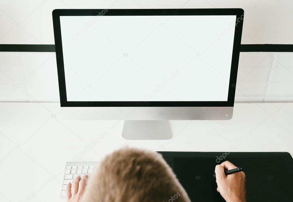 Man in his workspace with generic design computer — Stock Photo © kantver #80299718