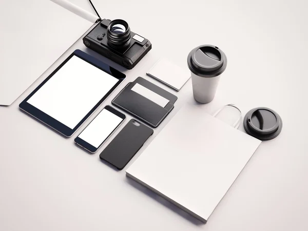 Photo of generic design branding elements on the concrete background ...