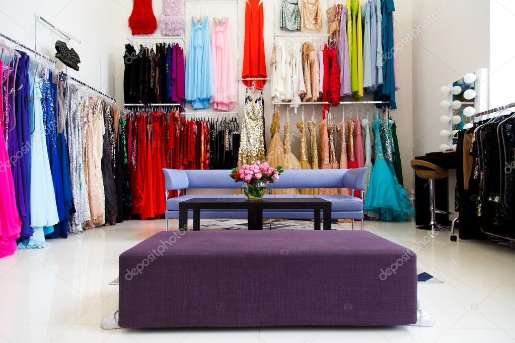 Evening dresses on hangers Stock Photo by ©GeniusKp 101728718