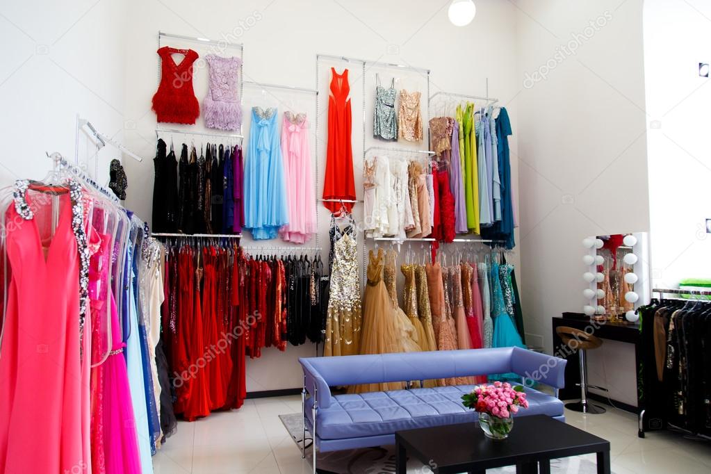 Dress shop with evening dresses Stock Photo by ©GeniusKp 101732086