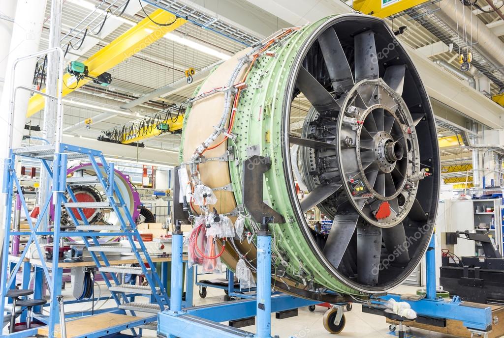 Big airplane engine during maintenance Stock Photo by ©eunikas 120851472