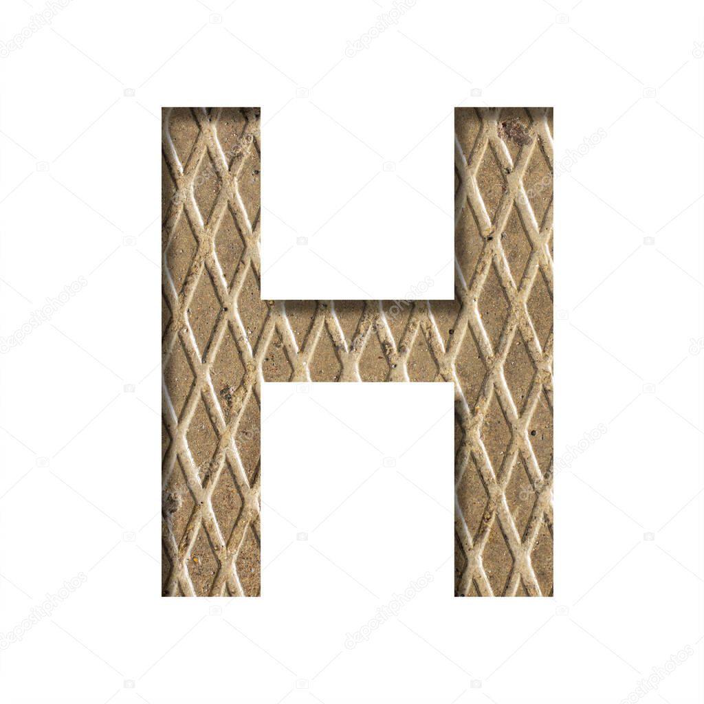 Fuente en una hoja de metal en relieve. La letra H se corta del papel ...