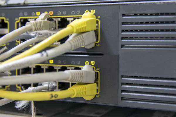 Information technology computer network, Ethernet telecommunication cables connected to internet ...