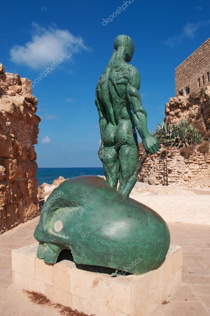 Israel, Middle East: a bronze statue in the Caesarea national park ...