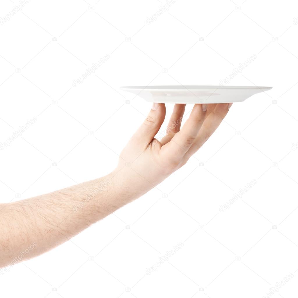 Hand holding a plate, composition isolated over the white background ⬇ ...