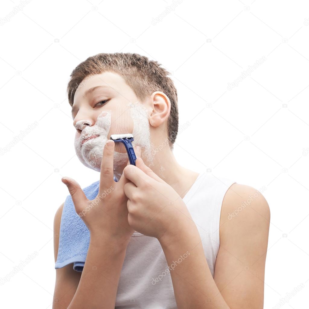 Young boy in process of shaving Stock Photo by ©exopixel 71172255