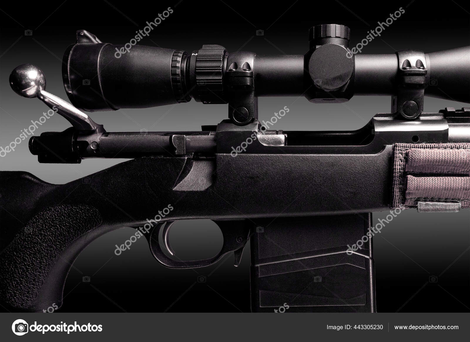 Bolt action rifle with riflescope close up on black background, copy ...