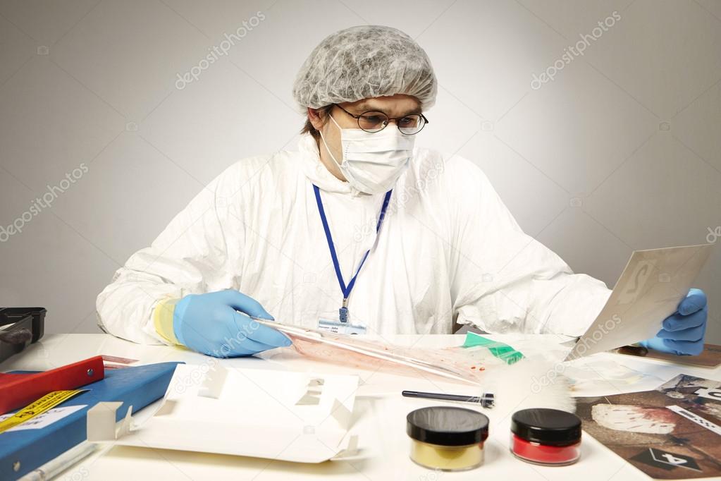Preparing for evidence testing in criminologist lab — Stock Photo ...