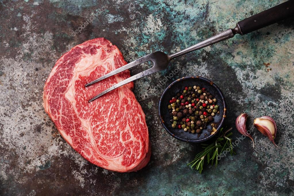 Raw Black Angus Steak — Stock Photo © lisovskaya #70371849