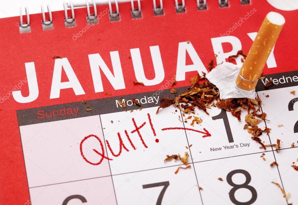 Broken cigarette on calendar — Stock Photo © BrianAJackson #57917889