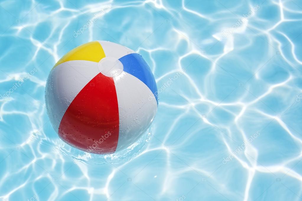 Beach ball in swimming pool — Stock Photo © BrianAJackson #84270034