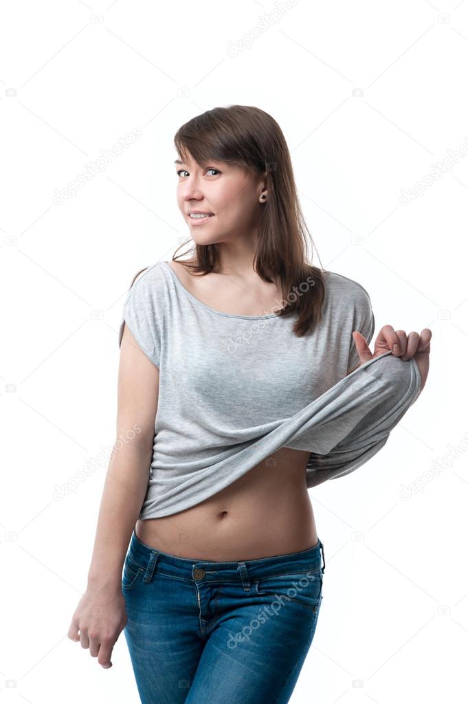 Woman pulls a T-shirt Stock Photo by ©Himchenko 66638025