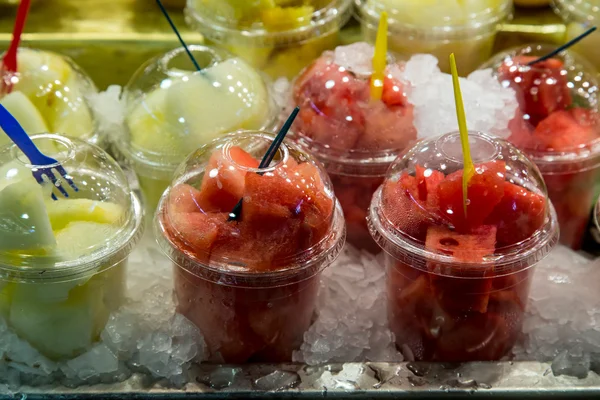 Fresh fruit salad with pieces of fruit and ice cubes Stock Photo by ...