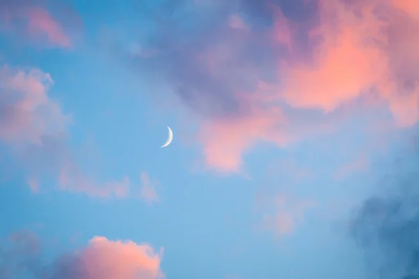 Pink clouds and moon heaven Stock Photo by ©Juhku 76025285