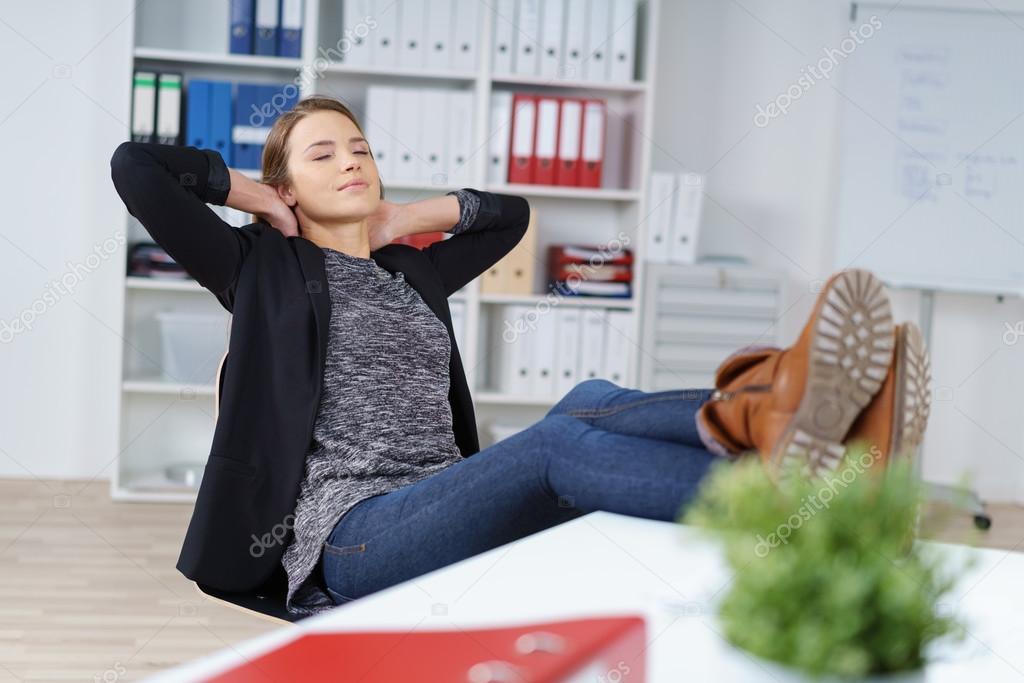 Woman Feet Up On Desk