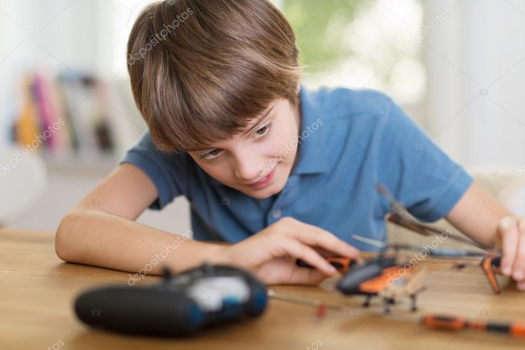 Young boy enjoying his hobby Stock Photo by ©racorn 55235225