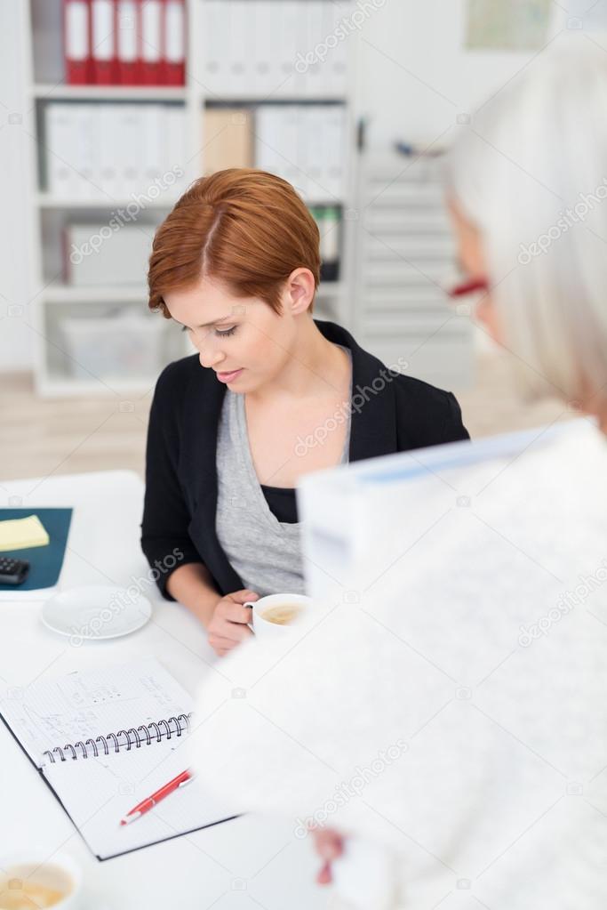 Pretty Office Woman Reading Some Notes — Stock Photo © racorn #83972798