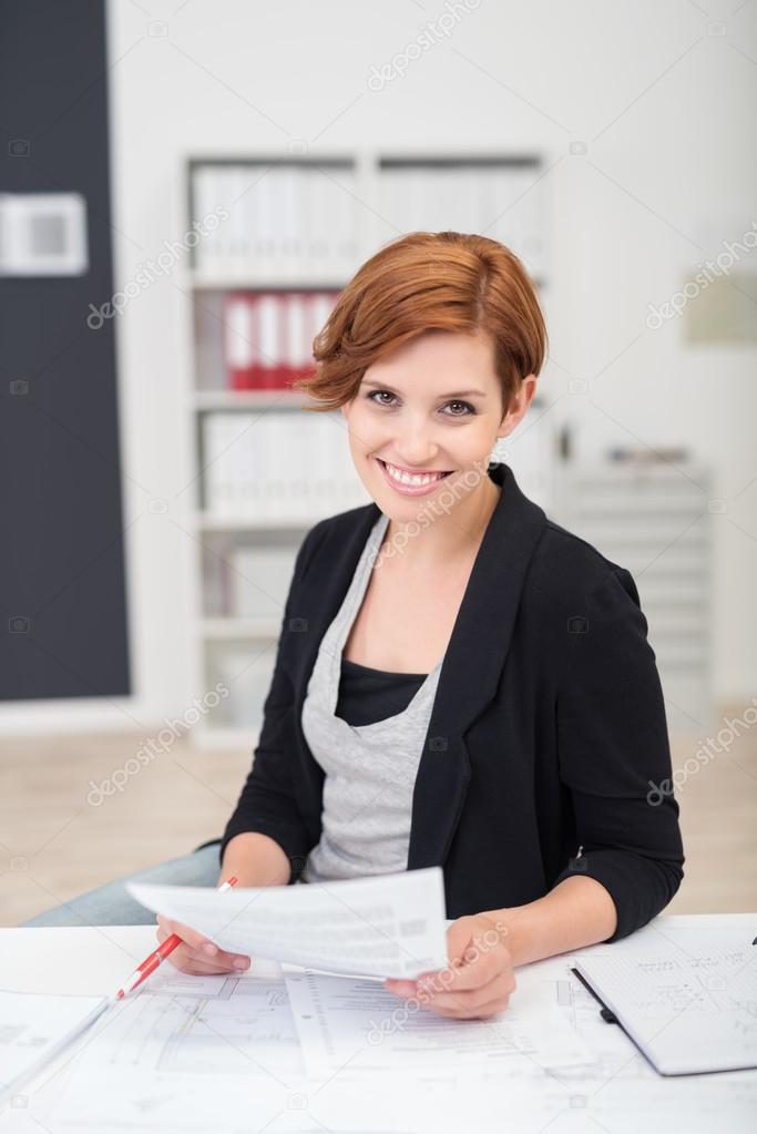 Pretty Office Woman Smiling at the Camera Stock Photo by ©racorn 83973158