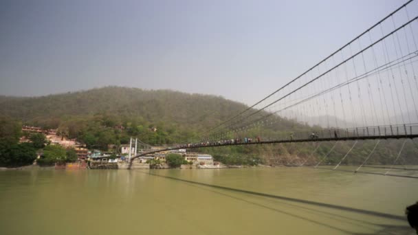 View of the Ram Jhula bridge — Stock Video © photo-deamles #62810851