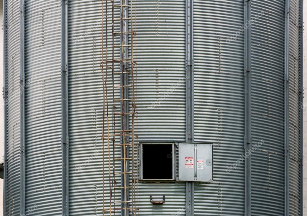 Storage tanks in rice mill, factory process production line in t ...