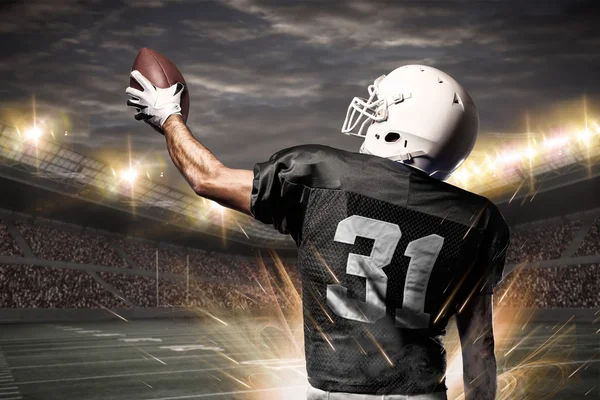 Football Player on a stadium - Stock Image - Everypixel