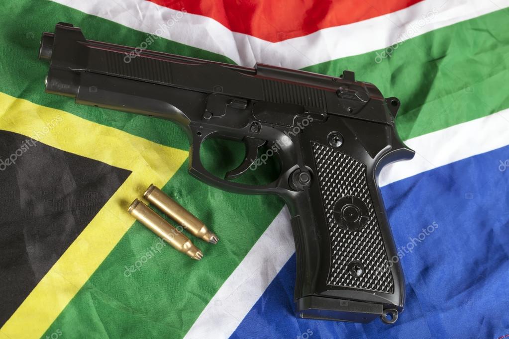 Pistola y balas de bronce en la bandera de Sudáfrica 2024