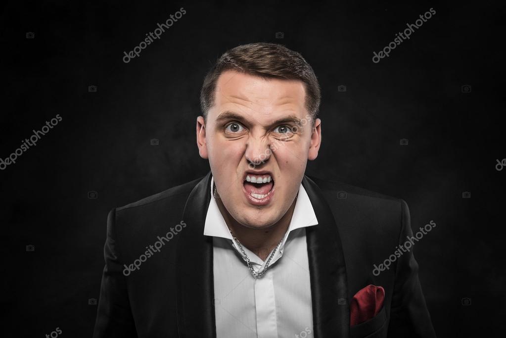 Drunk man on dark background. — Stock Photo © believeinme #103607194