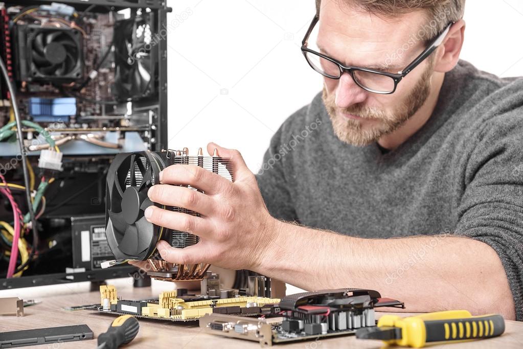 Computer technician installs cooling system. — Stock Photo ...
