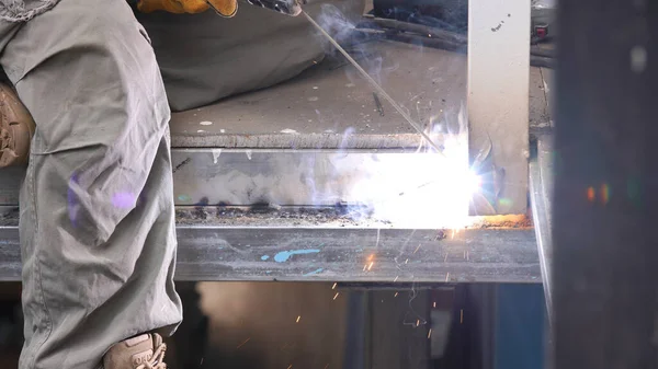Welding and Cutting steel work of craft man with iron sawing wheel ...