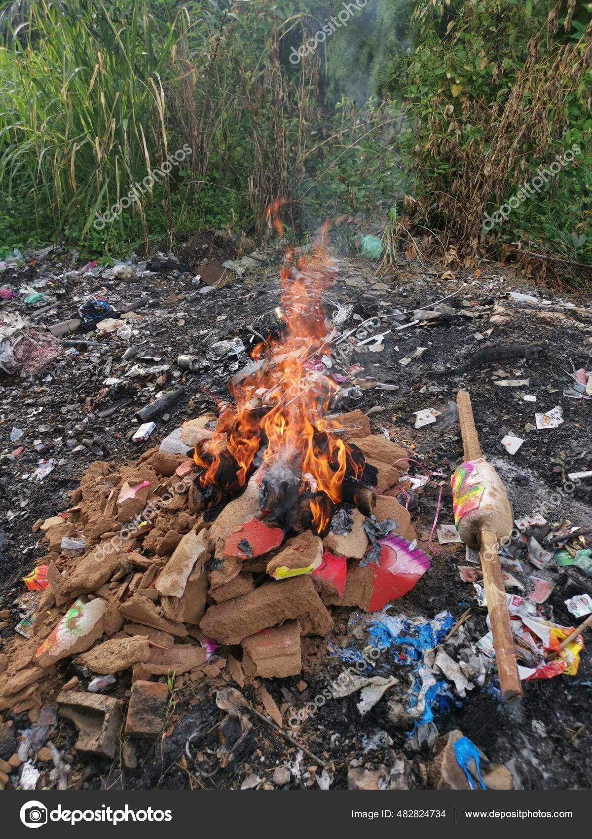 Open Rubbish Burning Rural Roadside — Stock Photo © sweemingyoung ...