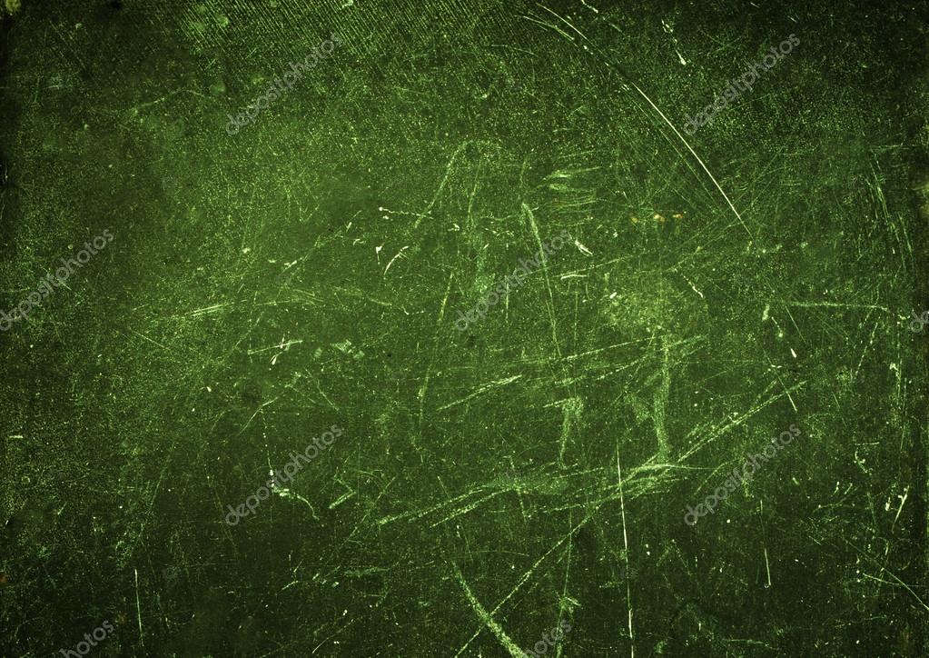 Green background with spotlight and scratch — Stock Photo © Zakharova ...