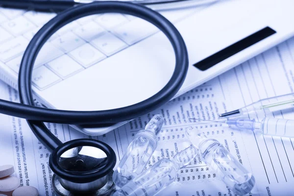 medical devices on the table at the doctor with blue toned - Stock ...