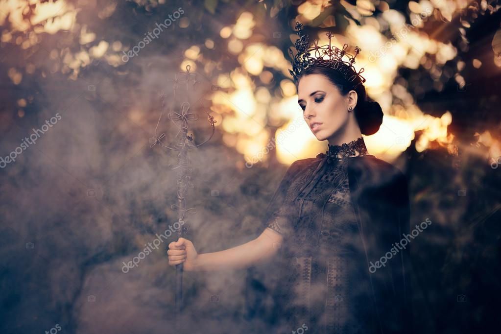 Evil Queen Holding Scepter in Misty Forest Stock Photo by ...
