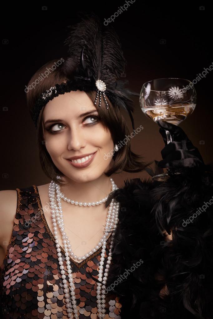 Retro 20s style woman holding champagne glass — Stock Photo ...