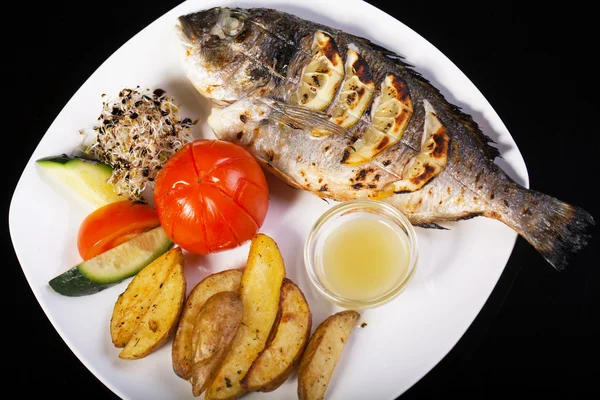 Grilled fish sea bream on barbecue - Stock Image - Everypixel