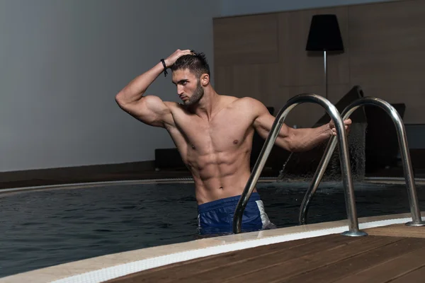 Bodybuilder pool Stock Photos, Royalty Free Bodybuilder pool Images ...