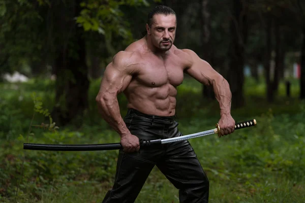Strong Man With Samurai Sword - Stock Image - Everypixel