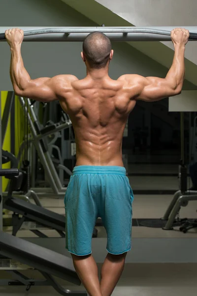 Male Athlete Doing Pull Ups - Stock Image - Everypixel